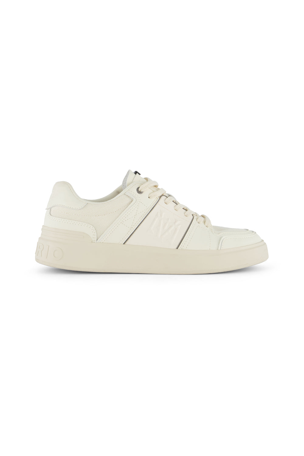 Cream-colored low-top sneakers